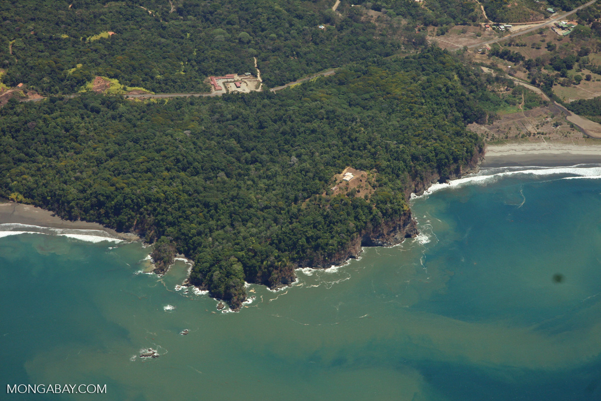 Aerial view of turquoise waters along Costa Rica's Pacific coastline ...